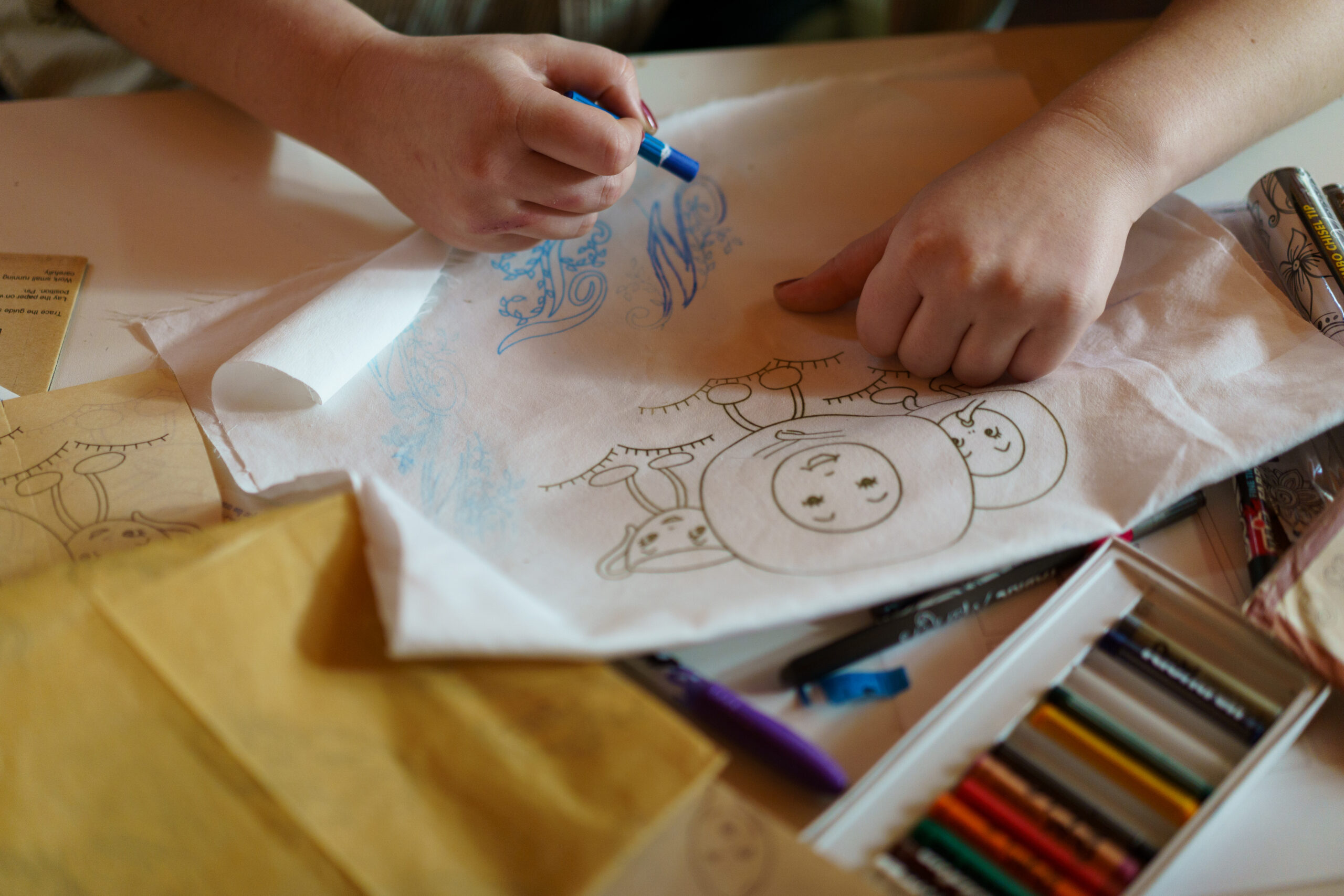 art_walk_participant_drawing_on_fabric | CHS Capitol Hill Seattle News