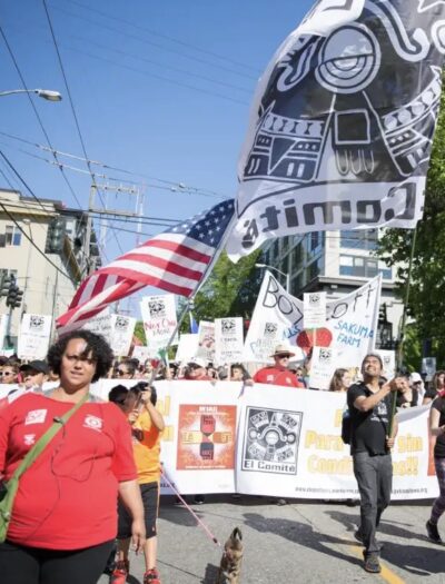 Seattle labor officials mark International Workers’ Day with ‘door-to ...